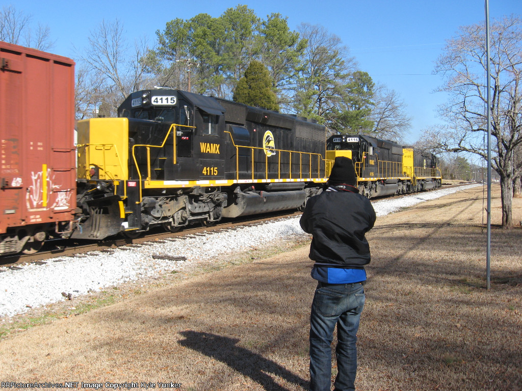 Josh enjoying the sights & sounds of a trio of SD40-2s